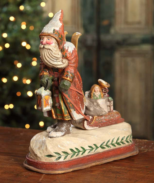 Pam Schifferl Santa Pulling Sled - TheHolidayBarn.com